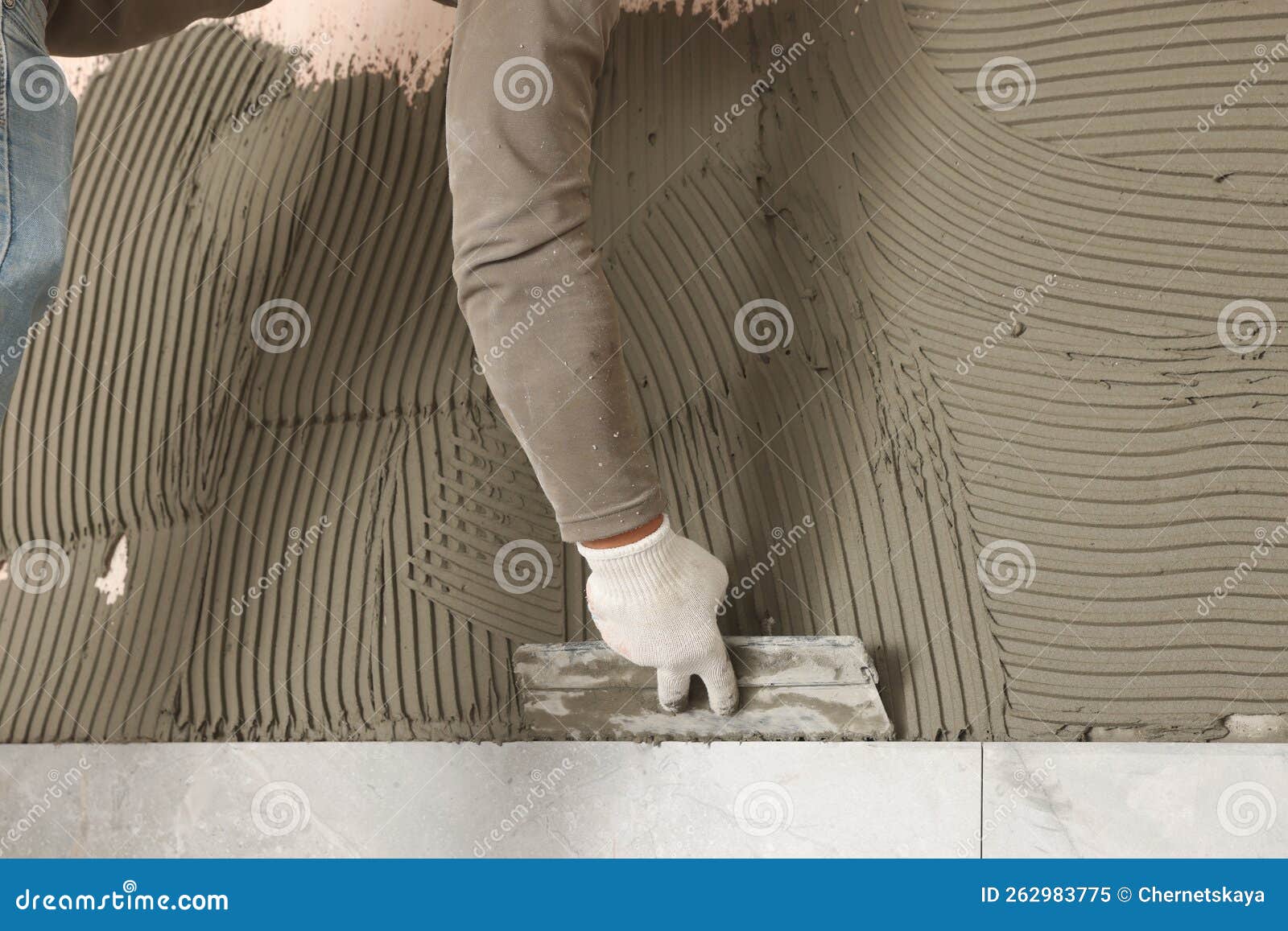 Worker Applying Cement on Wall for Tile Installation, Closeup Stock ...