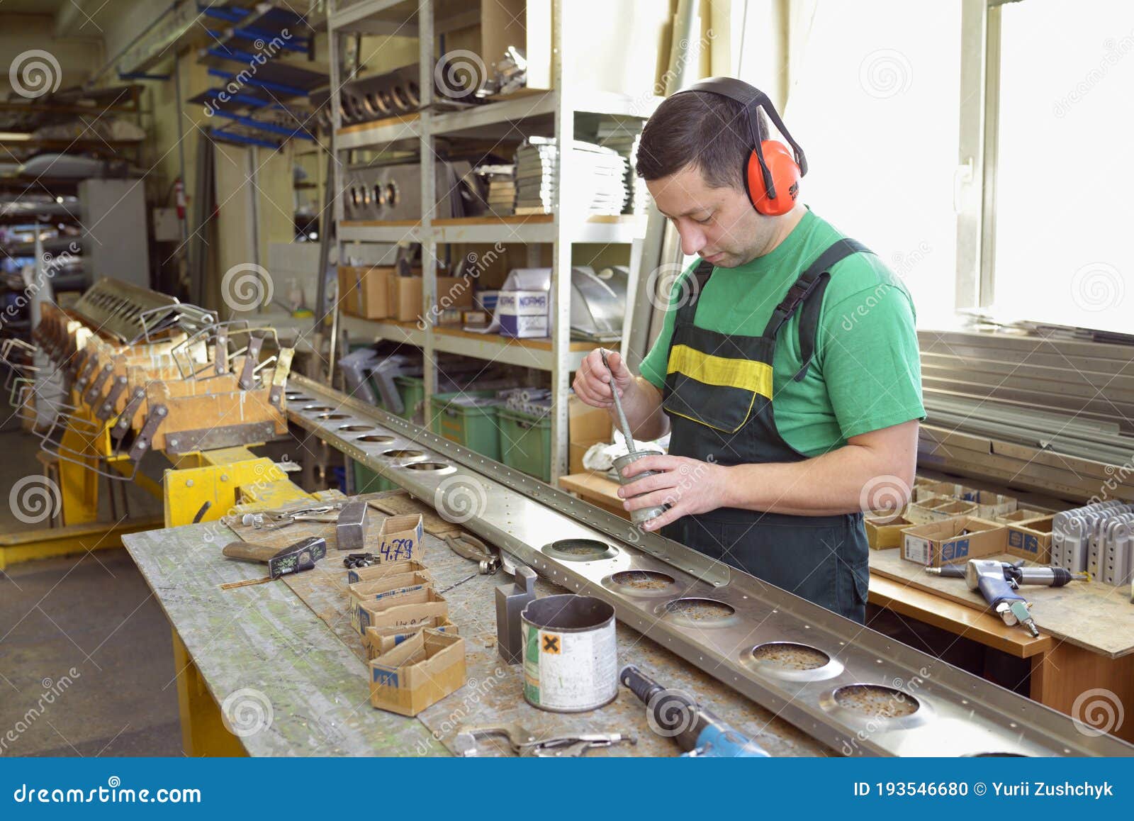 The Assembly Shop Interior. Light Plane, Worker Assembling A Body ...