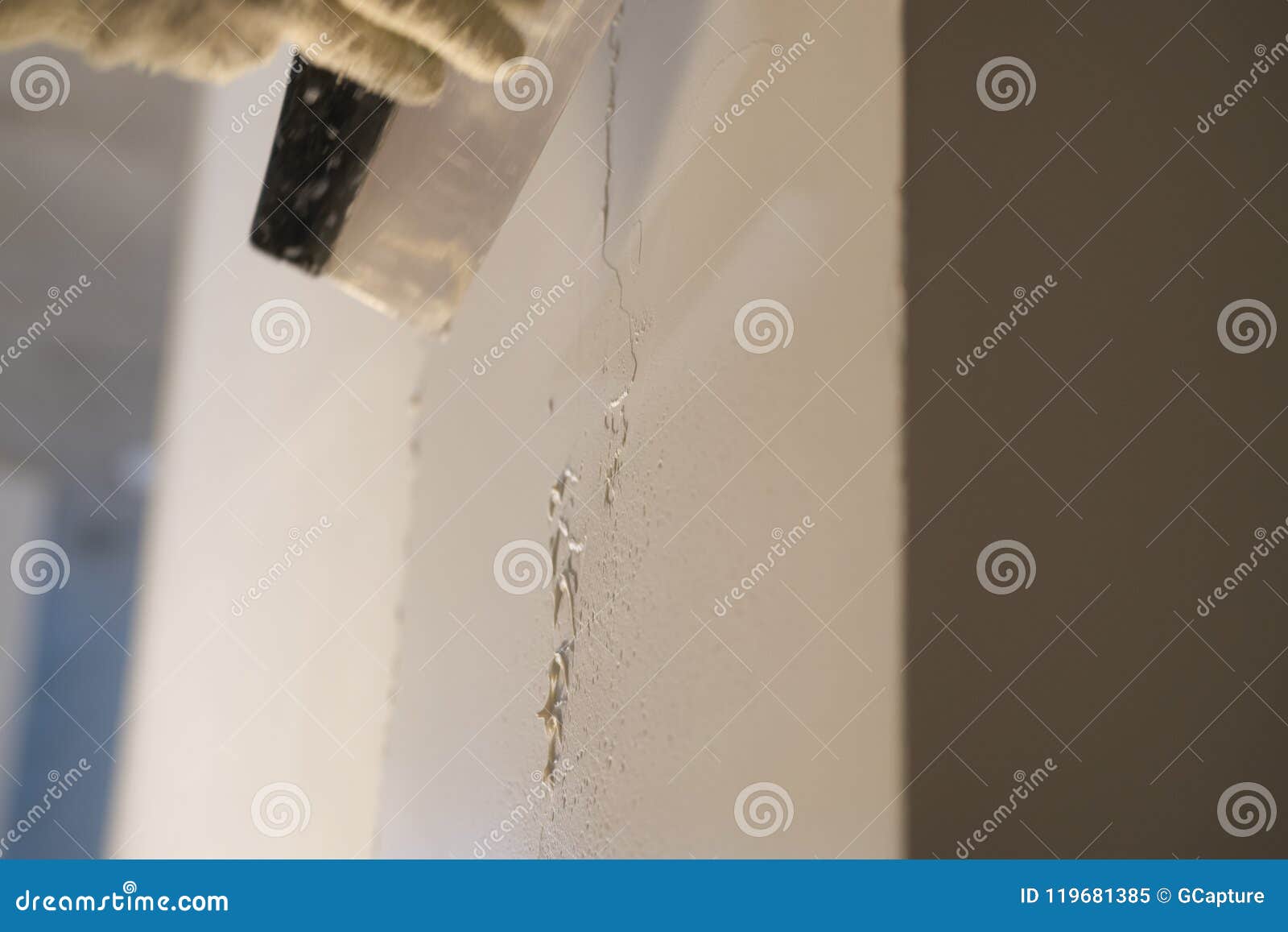 Worker Applying Putty on the Wall with Putty Knife Stock Image - Image ...