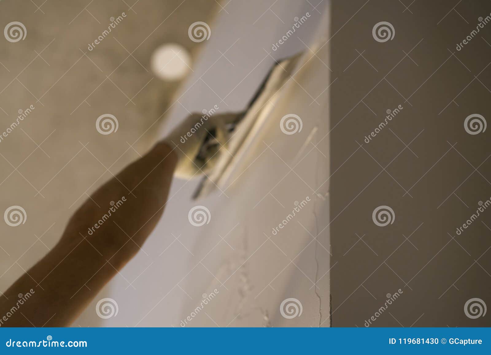 Worker Applying Putty on the Wall with Putty Knife Stock Photo - Image ...