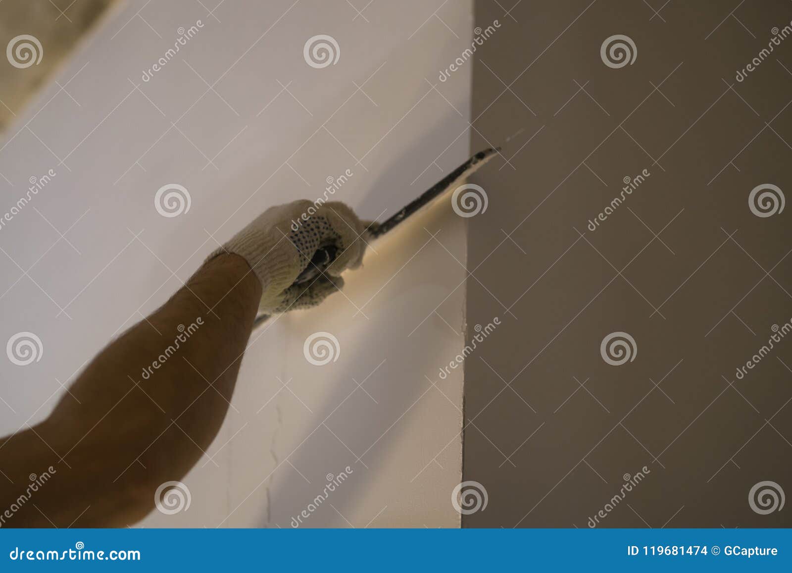 Worker Applying Putty on the Wall with Putty Knife Stock Photo - Image ...