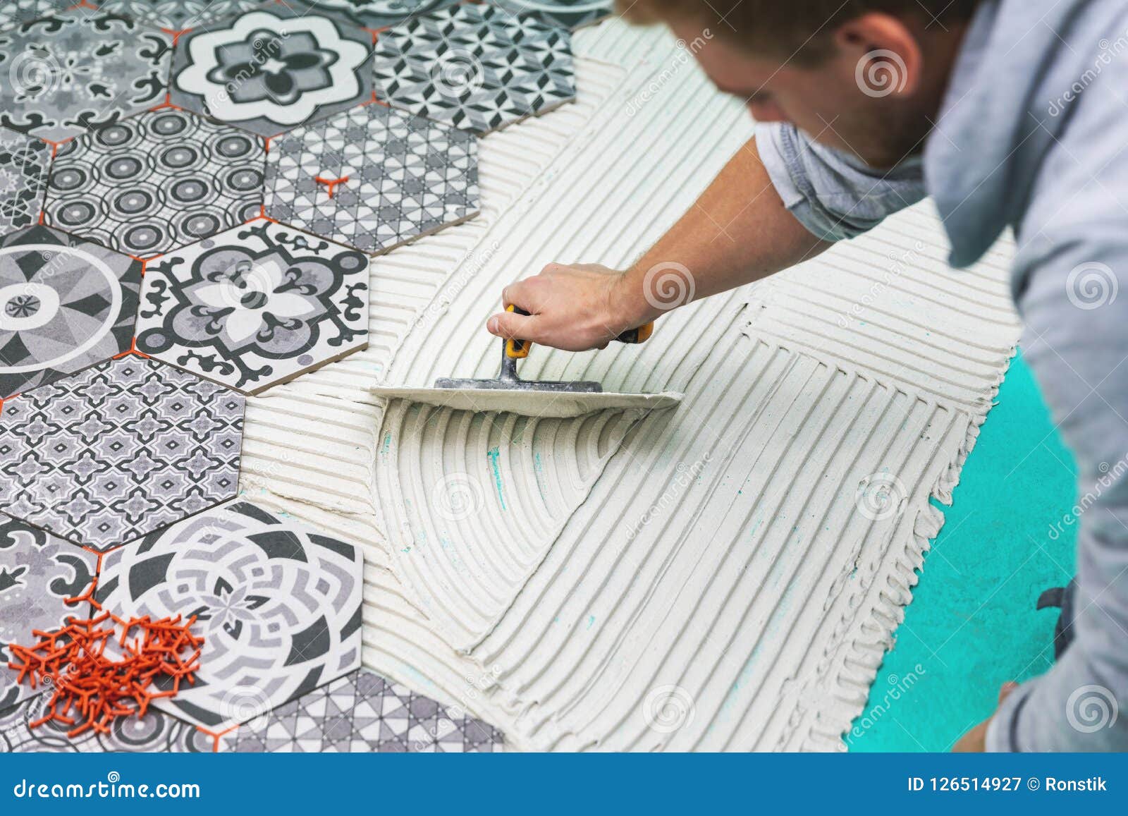 Worker Applying Tile Adhesive on the Floor Stock Image - Image of hand ...