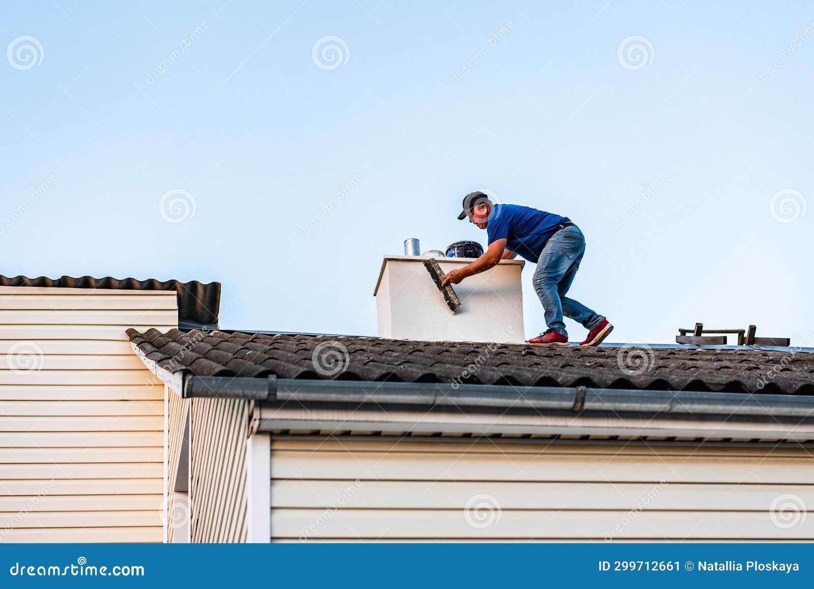 Worker Applying White Seamless Concrete Pebble-dash Plaster on Chimney ...