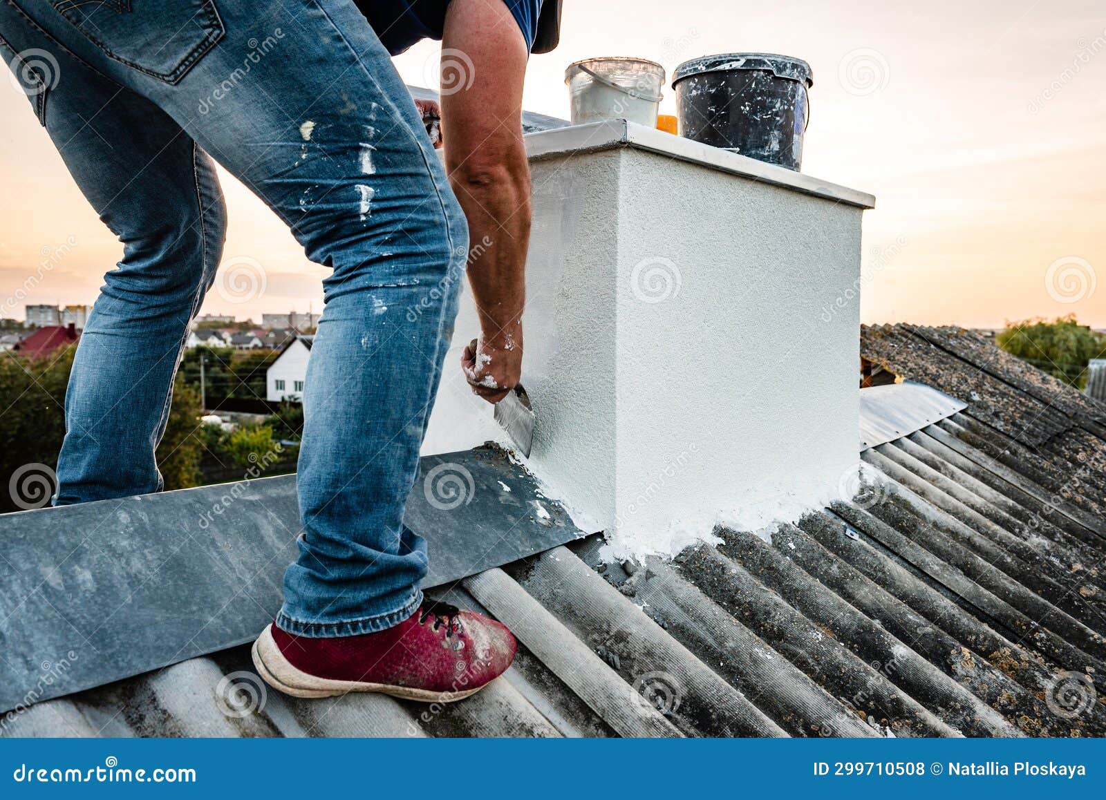 Worker Applying White Seamless Concrete Pebble-dash Plaster on Chimney ...