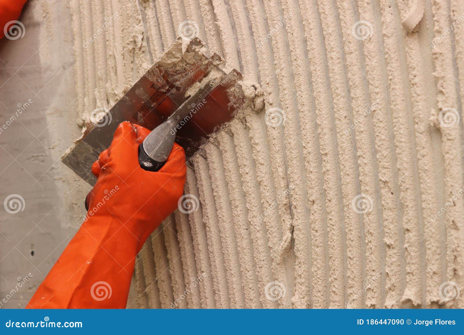 Applying Thinset Mortar On A Tile. Apply The Adhesive, Closeup. Stock ...