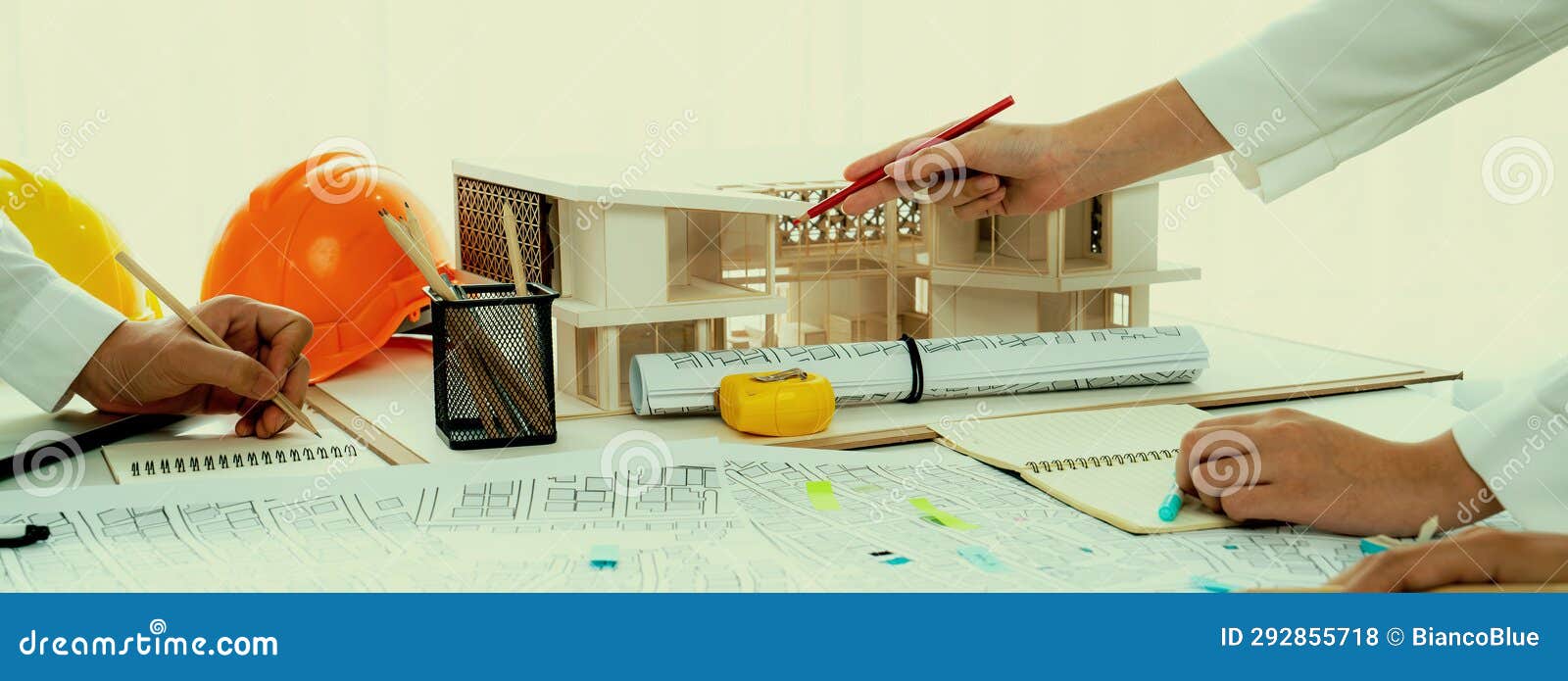 Worker, Architect and Engineer Work on Real Estate Construction Project ...