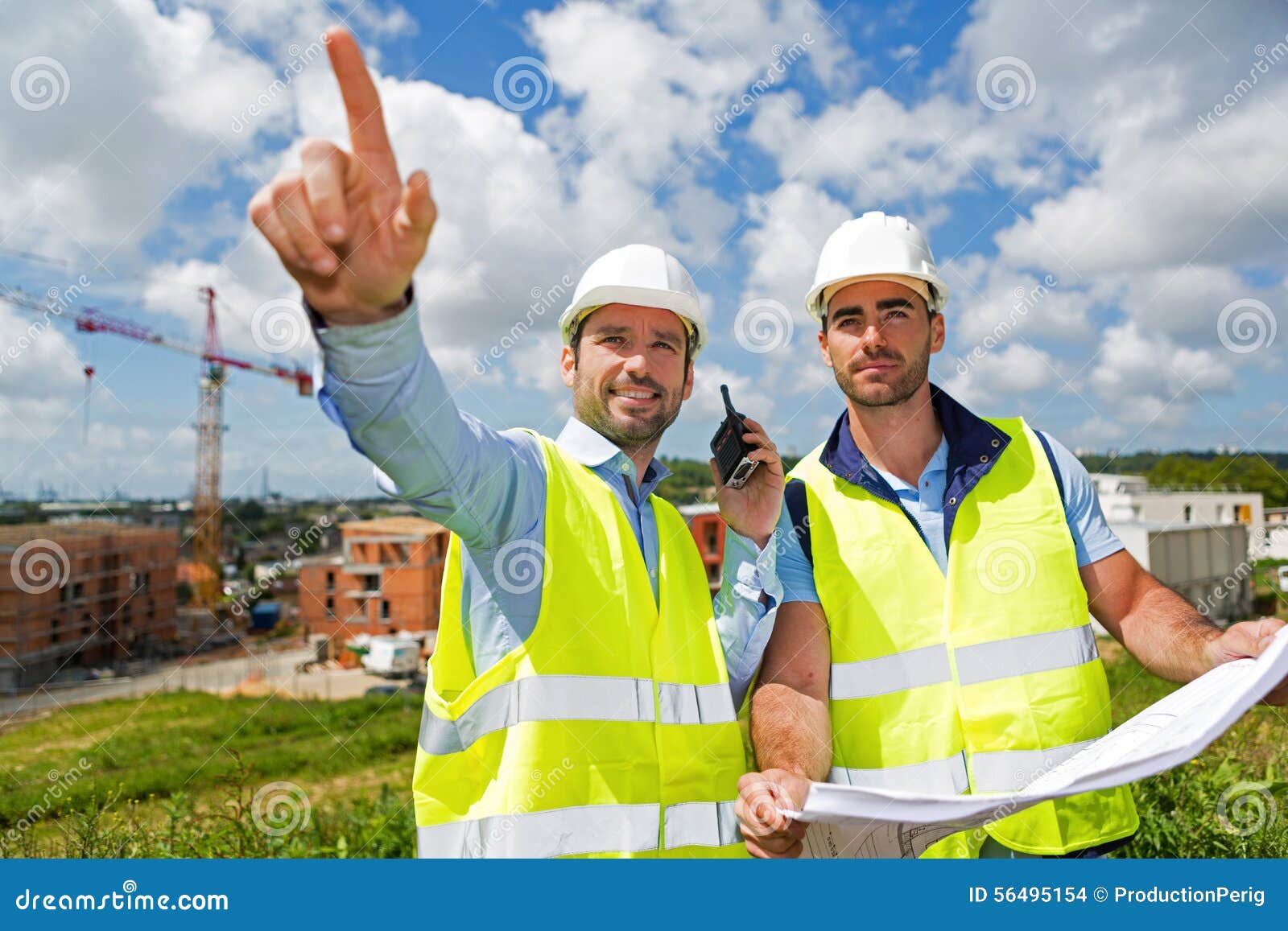 Worker and Architect Watching Some Details on a Construction Stock ...