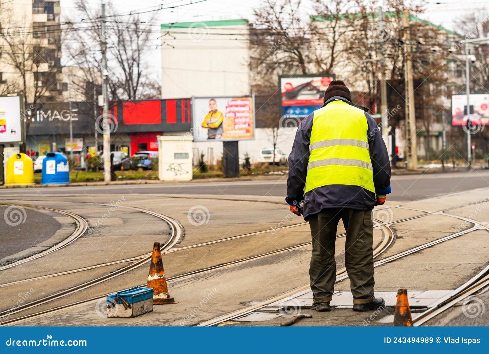 Worker Arranging Traffic Cone on Tram Railway in Bucharest, Romania ...