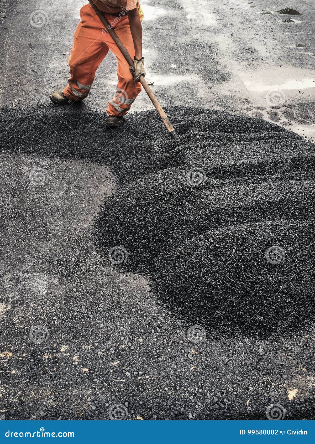 A Worker Asphalt Road in the Summer Stock Photo - Image of shovel ...
