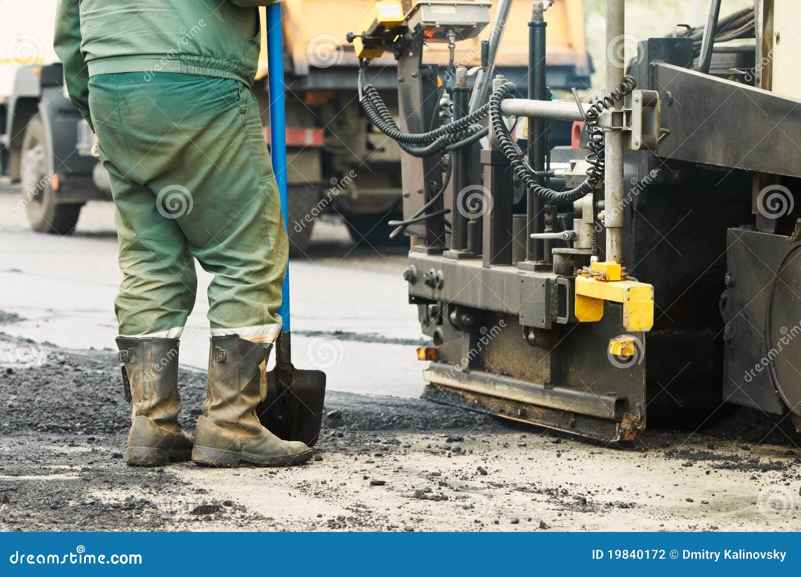 Worker at asphalting works stock photo. Image of laborer - 19840172