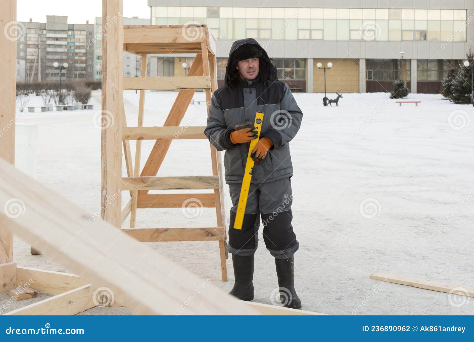 Worker Assembling the Frame of a Wooden Slide Stock Photo - Image of ...
