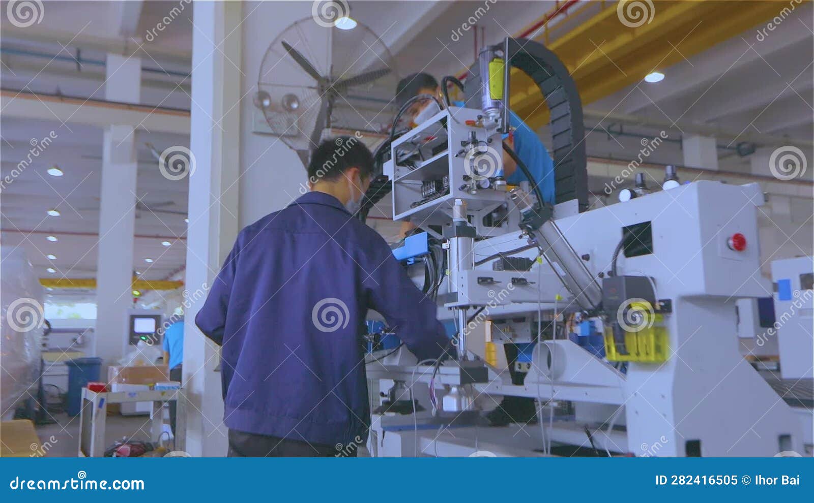 The Worker is Assembling the Machine, Close-up. CNC Assembly Process ...