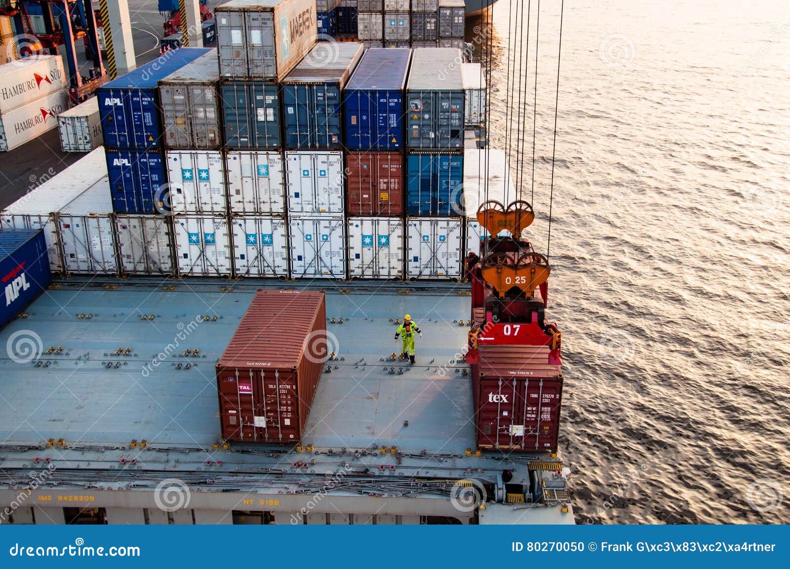 Worker Assisting Container Uploading at Dock Editorial Image - Image of ...