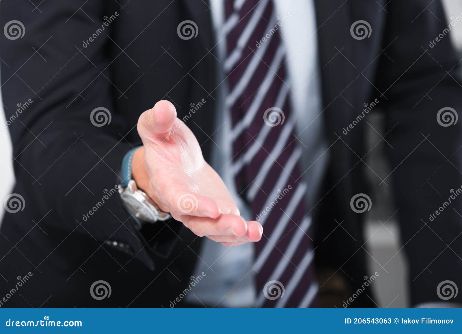 Worker in Black Suit Offering One S Hand Stock Image - Image of ...