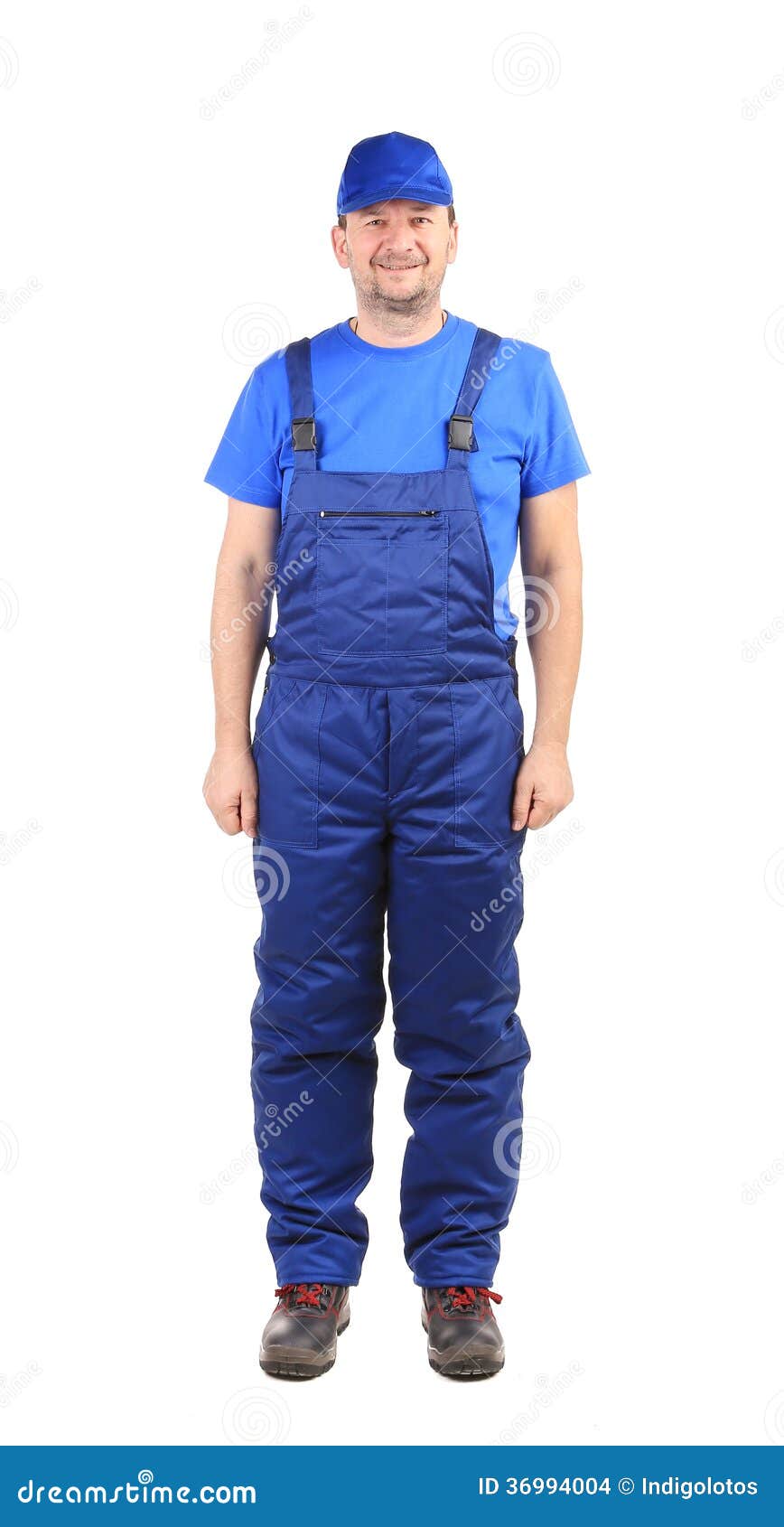Worker in blue overalls. stock photo. Image of portrait - 36994004