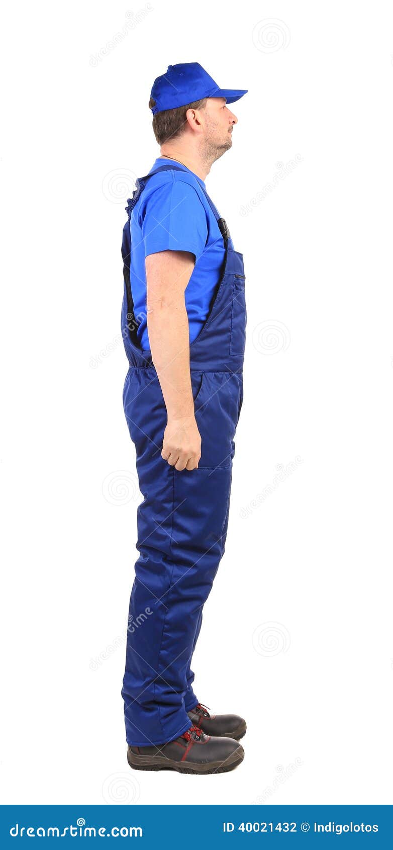 Worker in Blue Overalls. Side View Stock Photo - Image of background ...