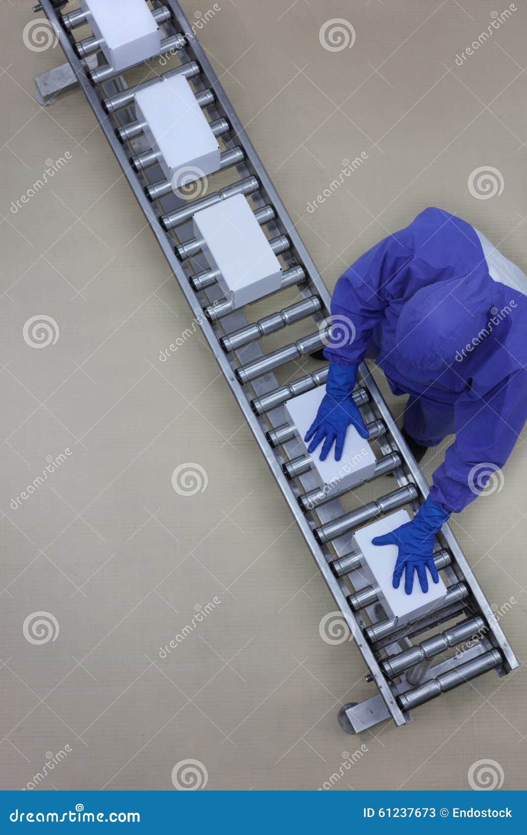 Worker in Blue Uniform Working with Boxes on Packing Line Stock Image ...