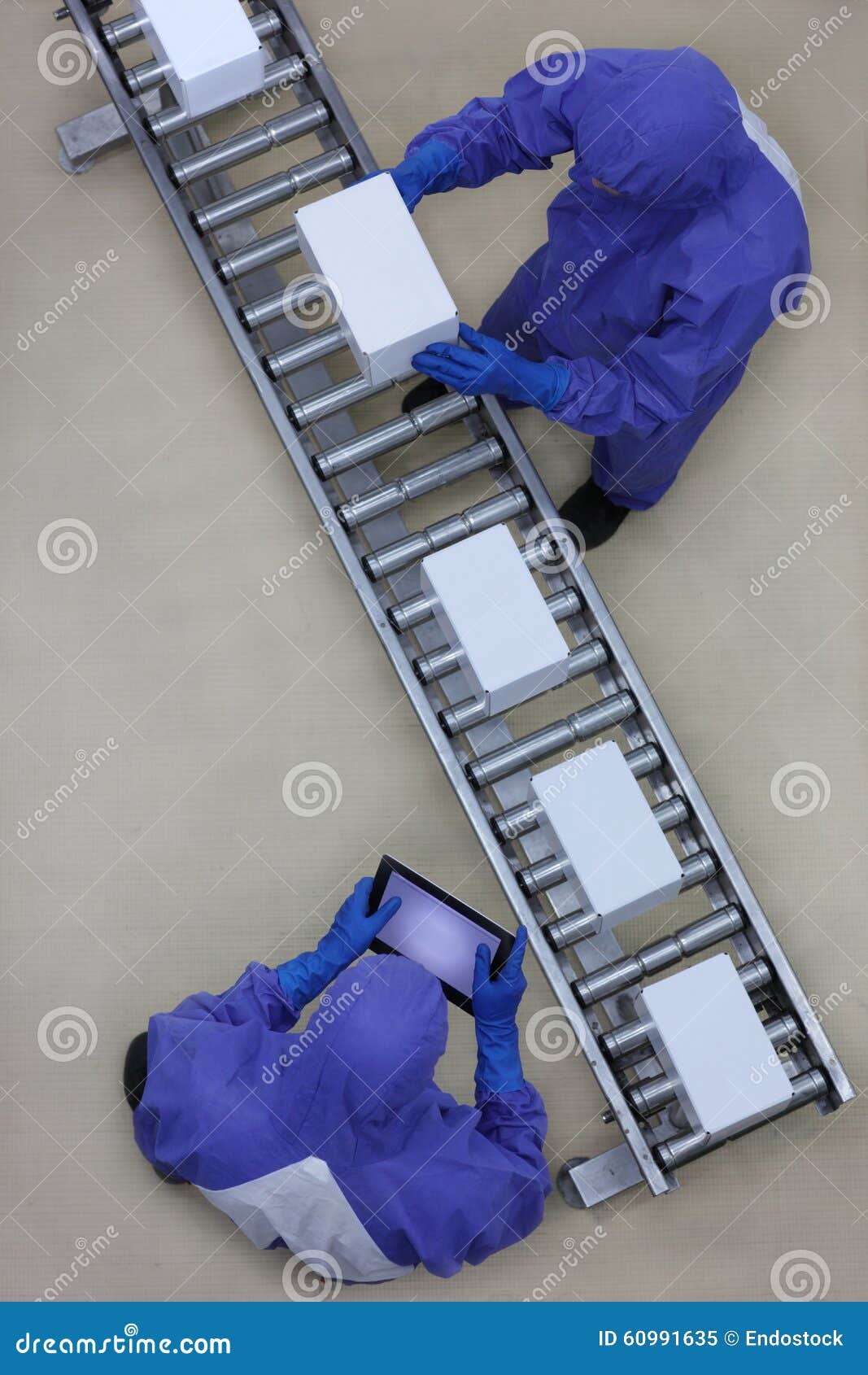 Worker in Blue Uniform Working with Boxes on Packing Line Stock Image ...