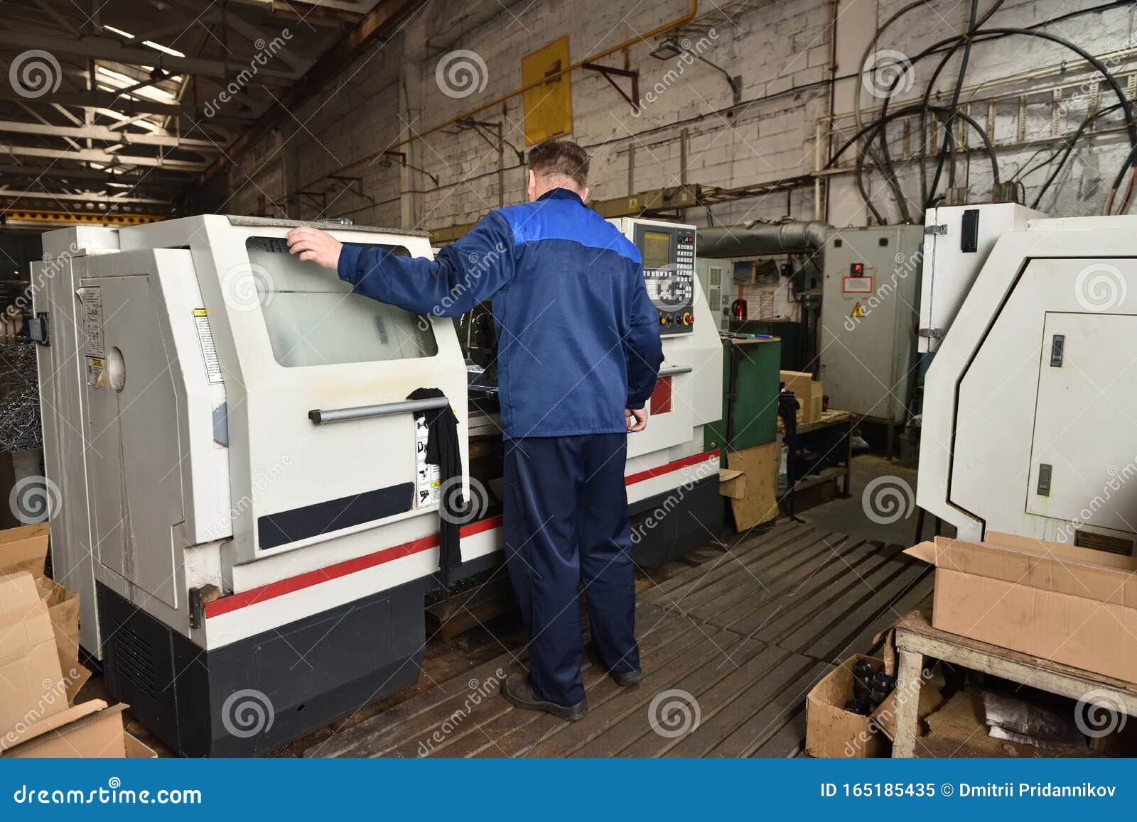 Worker Operator Of The Aerial Platform At The Workplace. Installation ...