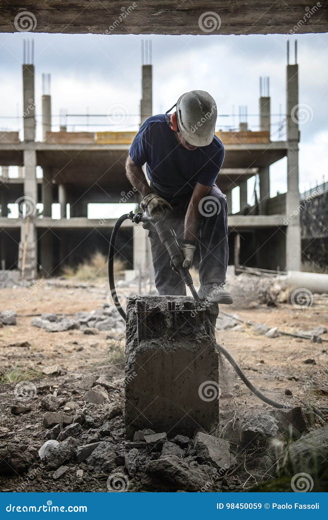 Worker Breaks the Concrete with a Pneumatic Hammer - 2017 Editorial ...
