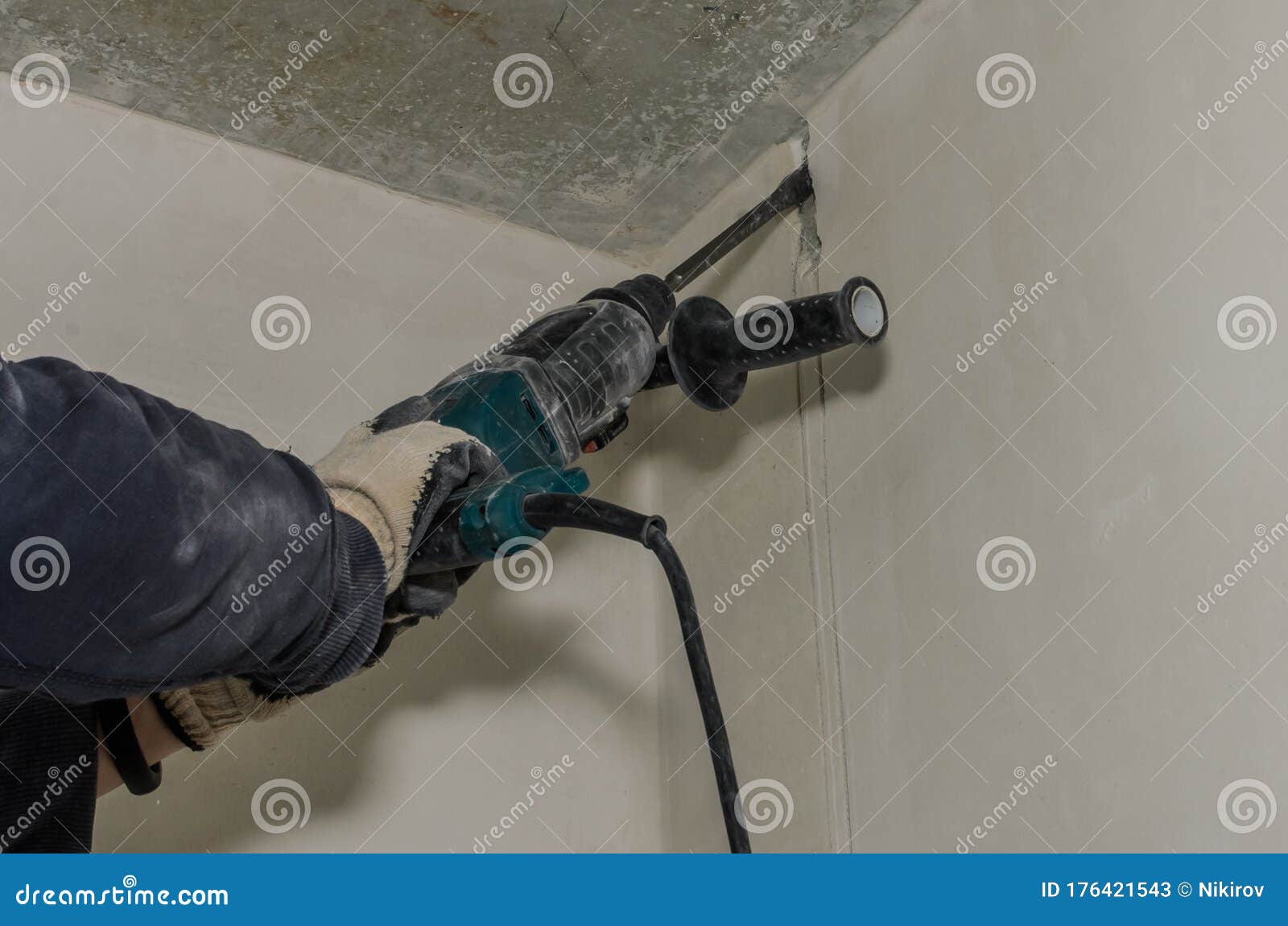 Worker Breaks a Concrete Wall with a Perforator Chisel Stock Image ...