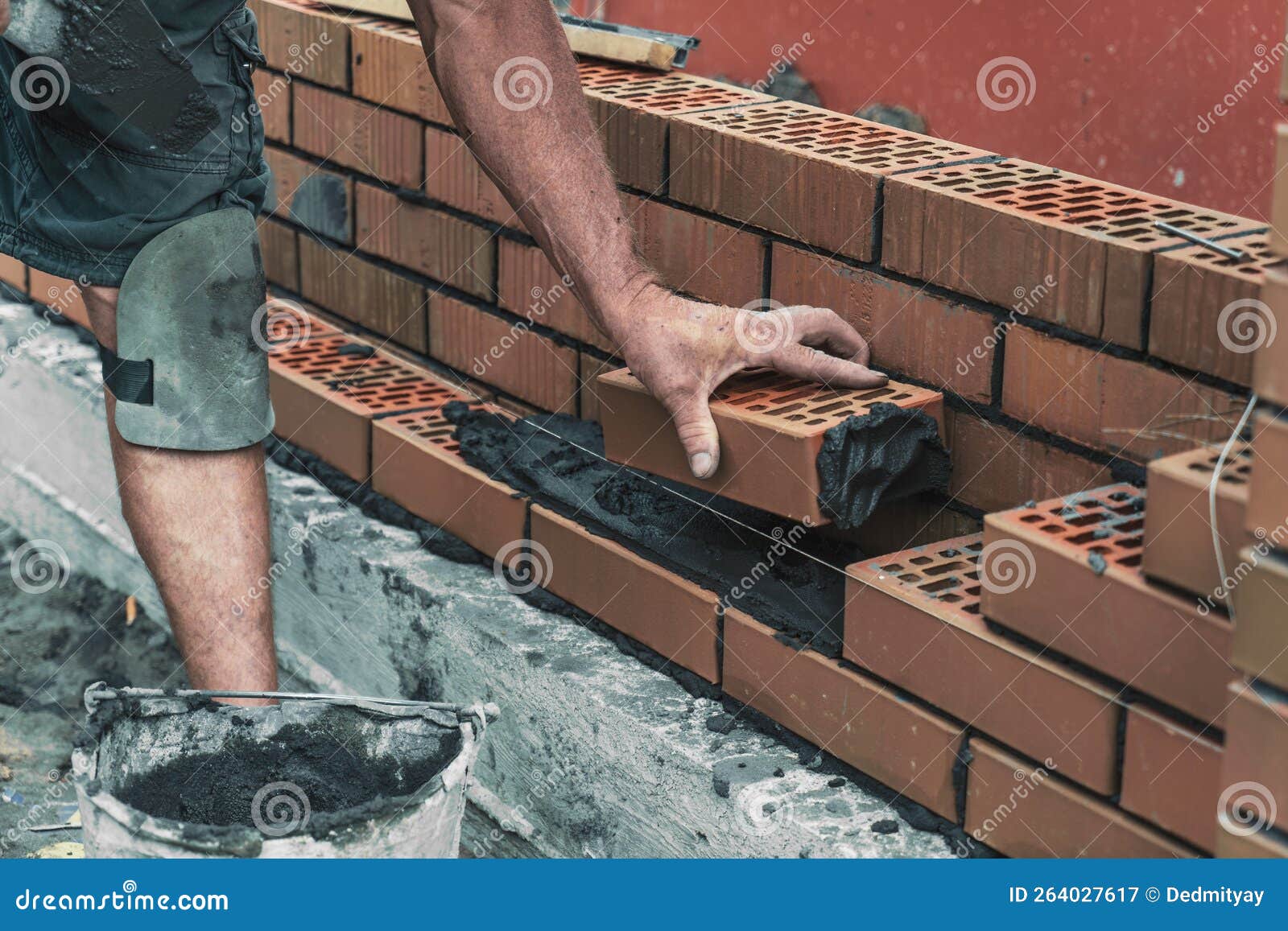 Worker or Bricklayer Laying Bricks. Builder Makes Brickwork on ...