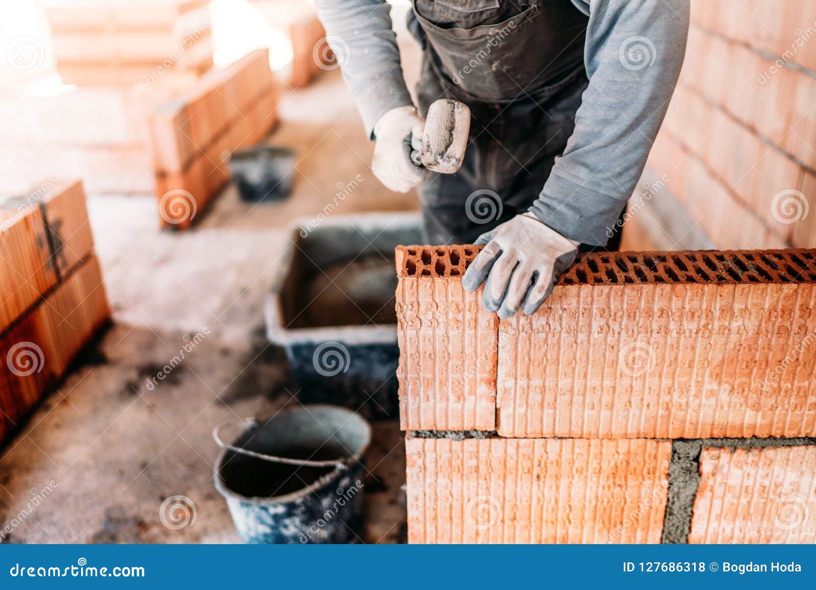 Worker, Bricklayer and Mason Working with Bricks and Building Interior ...
