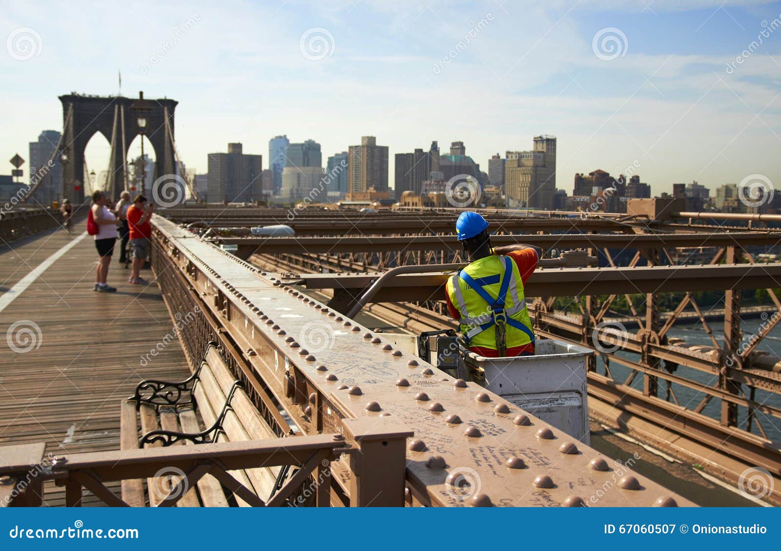 Worker on Brooklyn Bridge. editorial photography. Image of inspecting ...