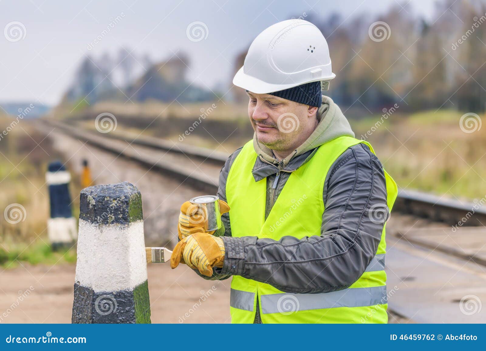 Worker with Brush and Paint on the Railway Stock Photo - Image of rail ...
