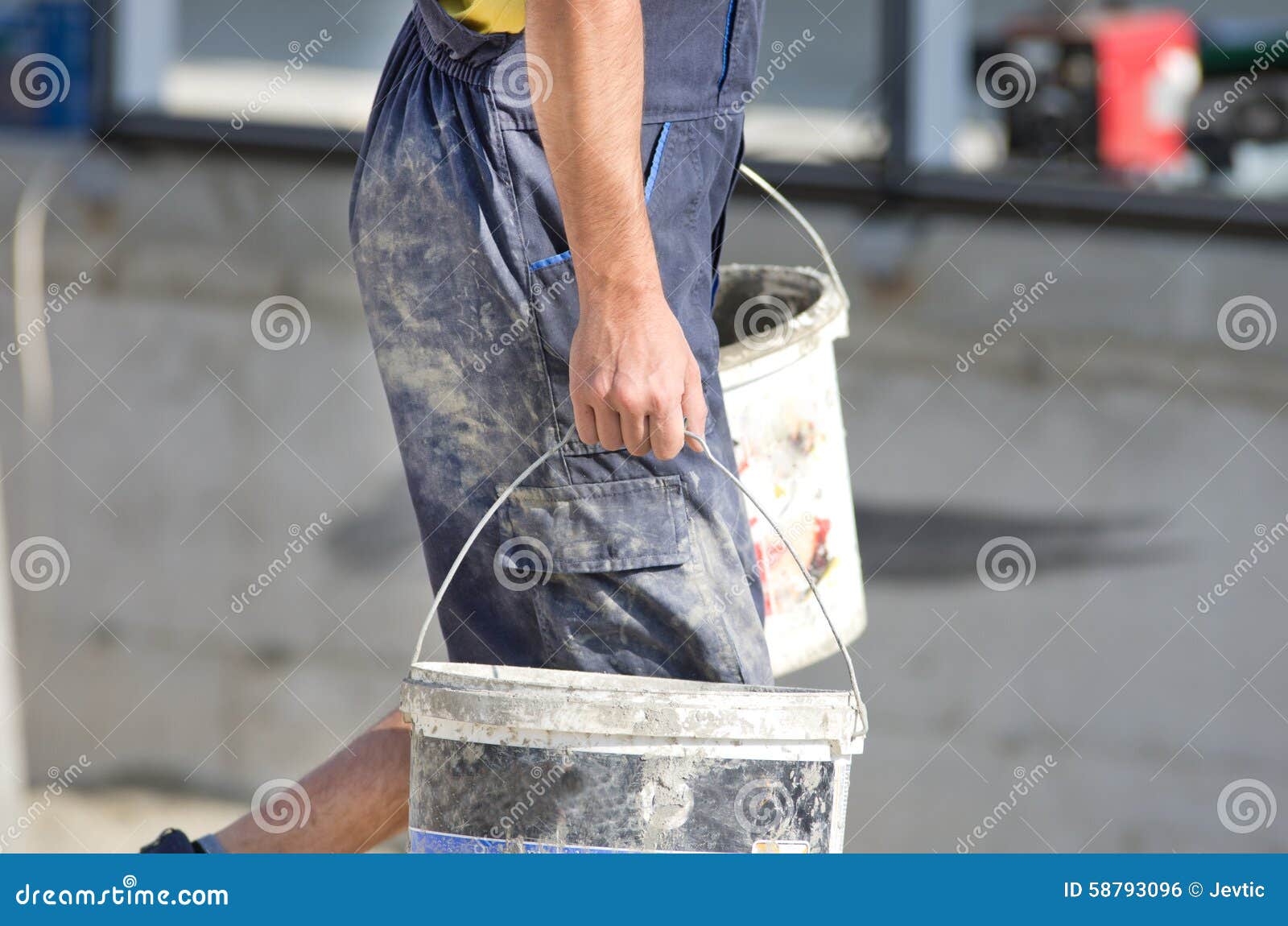 Worker with buckets stock photo. Image of craft, carrying - 58793096