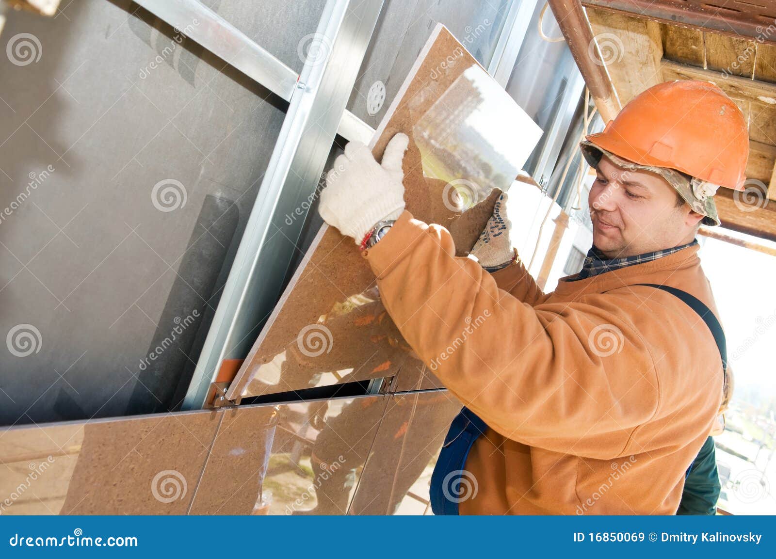 Worker Builder at Facade Tile Stock Image - Image of tiling, tile: 16850069