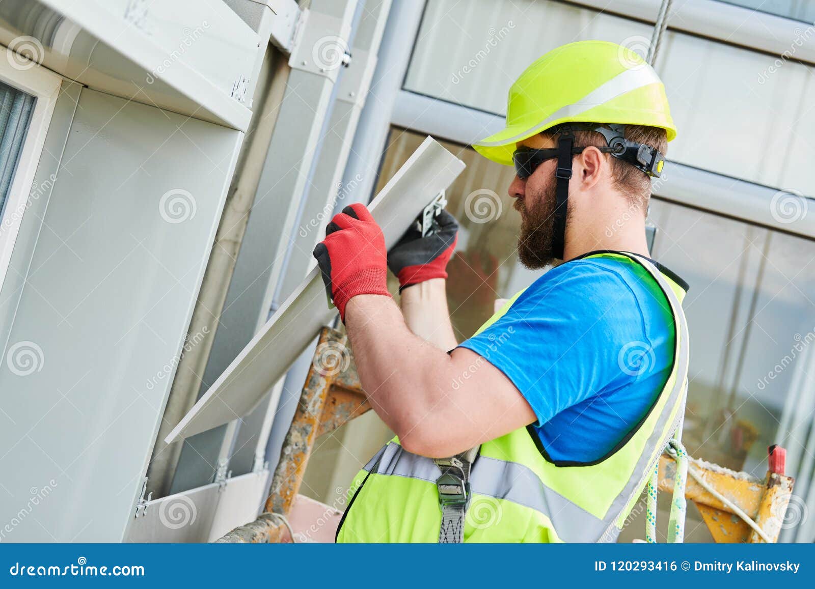 Facade Builder Installing Tile on Wall Stock Photo - Image of plasterer ...