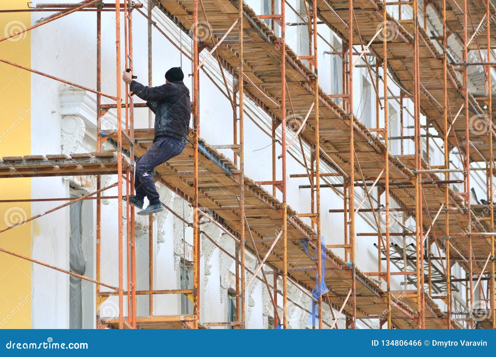 Building Facade Restoration Process. Worker. Editorial Photo - Image of ...