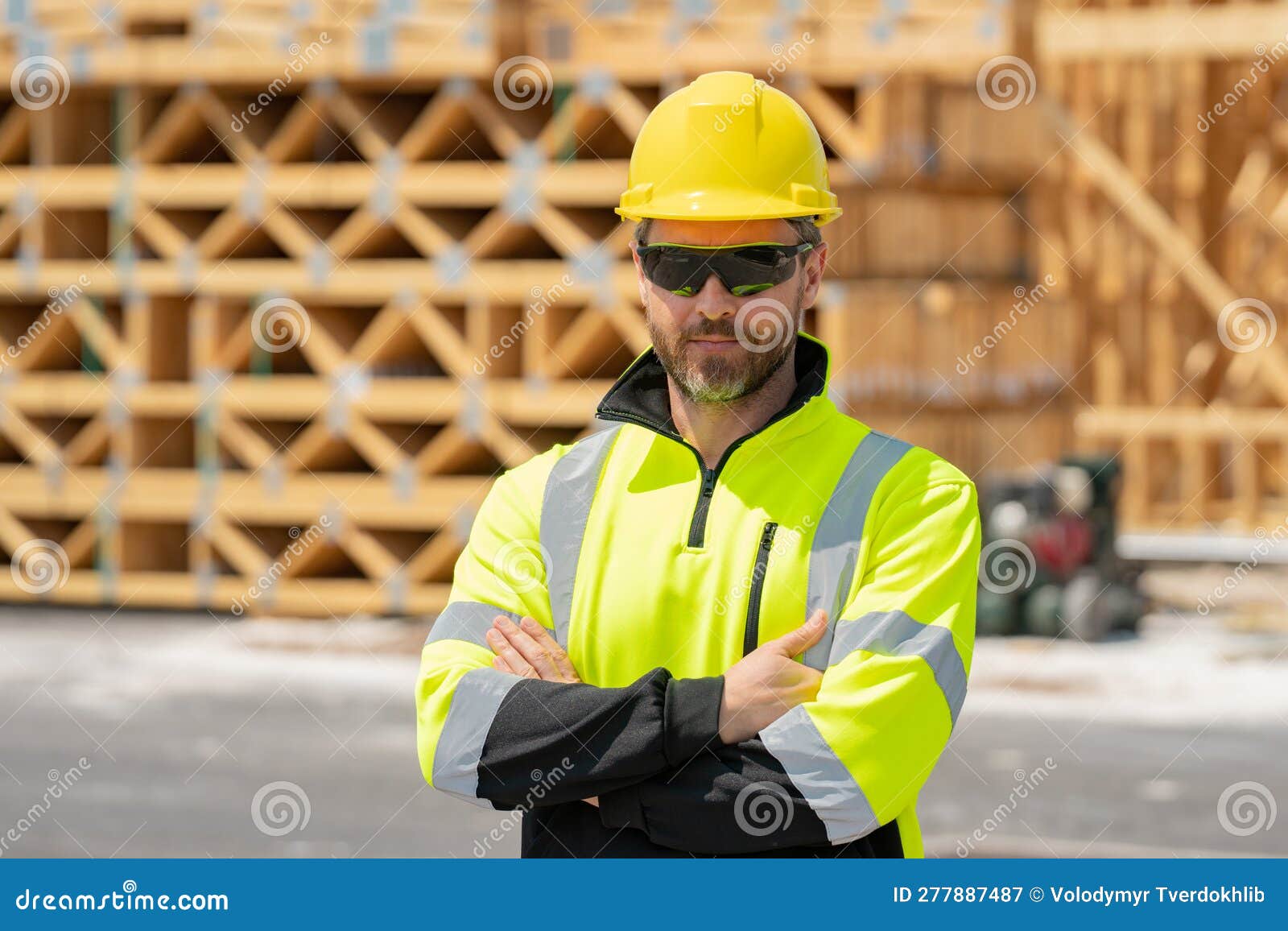Worker in Building Uniform on Buildings Construction Background ...