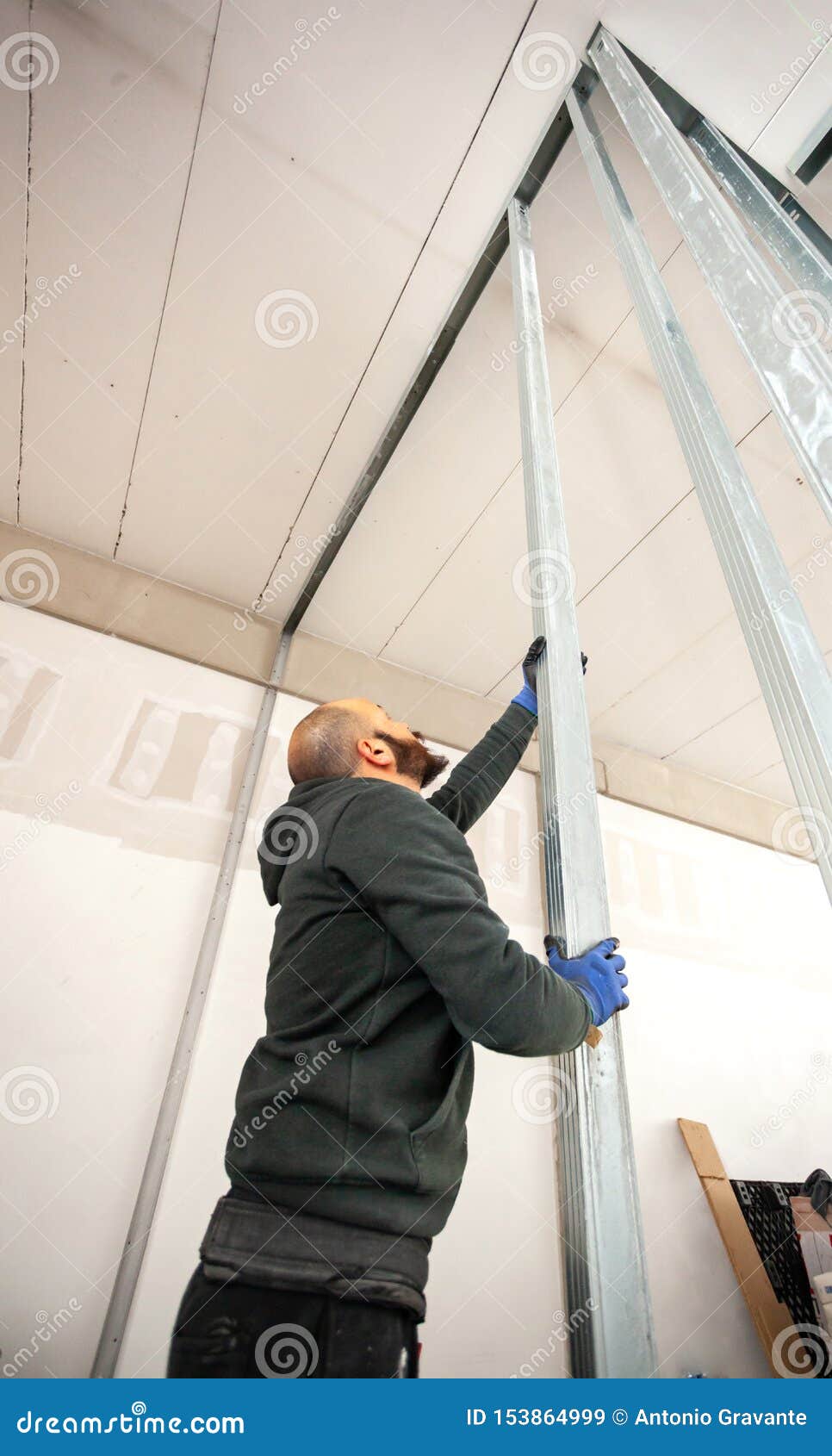 Worker Builds a Plasterboard Wall Stock Image - Image of gypsum, craft ...