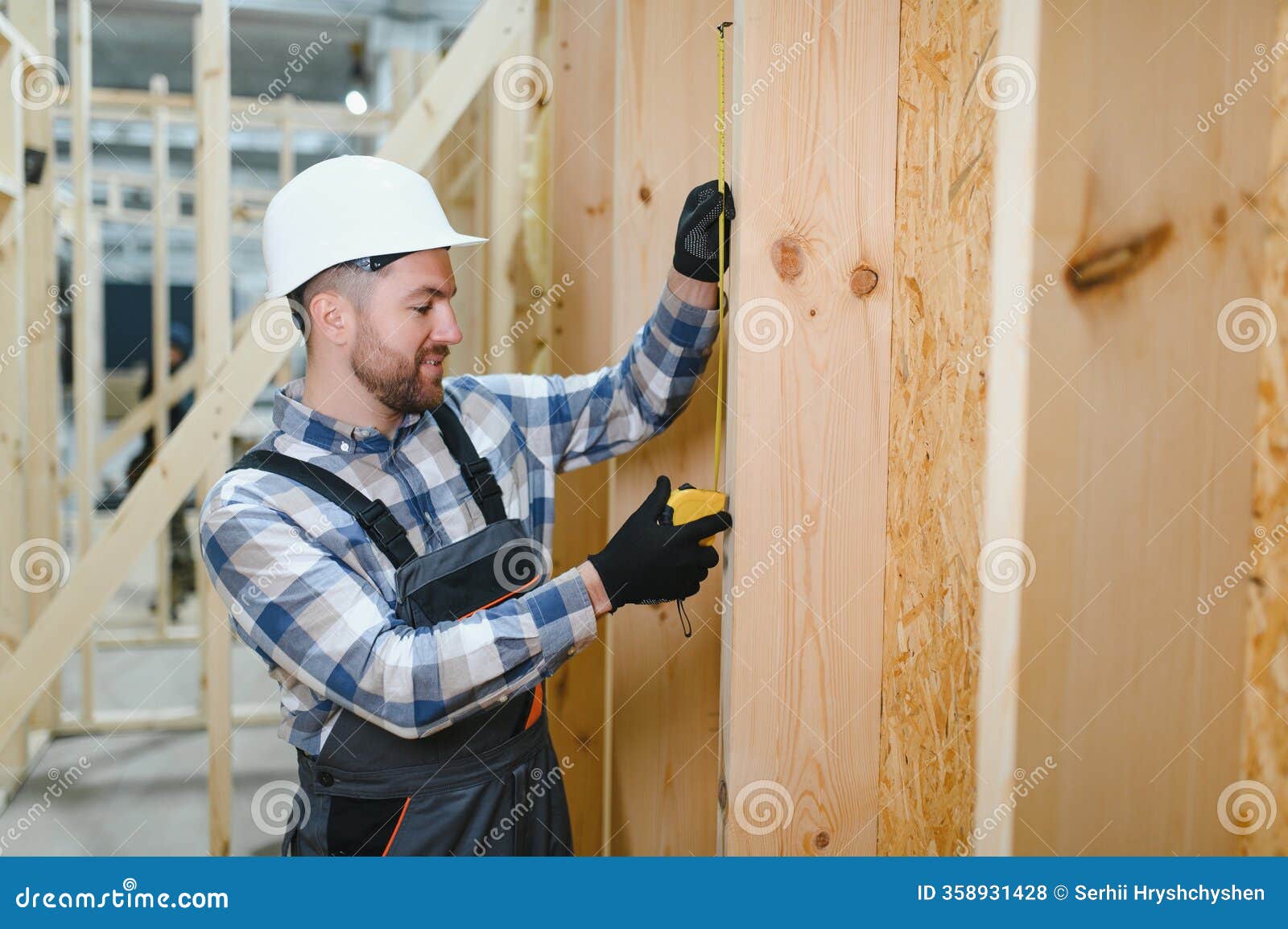 Worker Carpenter Assembling a Modular House Stock Photo - Image of ...