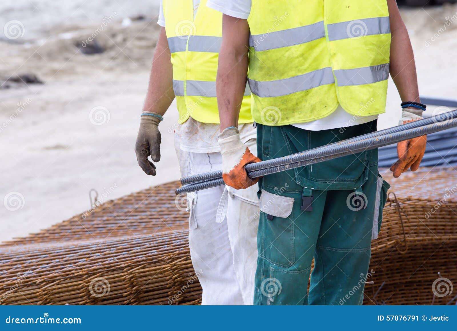 Worker carrying armature stock image. Image of detail - 57076791