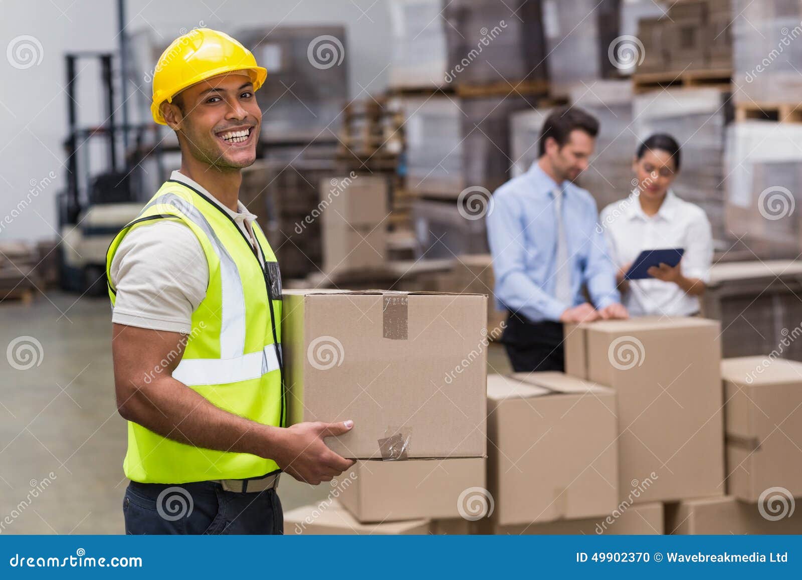 Worker Carrying Box in Warehouse Stock Photo - Image of packaging ...