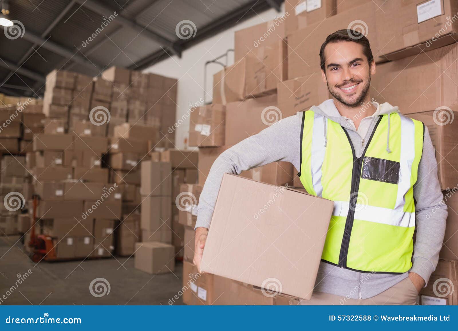 Worker Carrying Box in Warehouse Stock Photo - Image of carrying ...