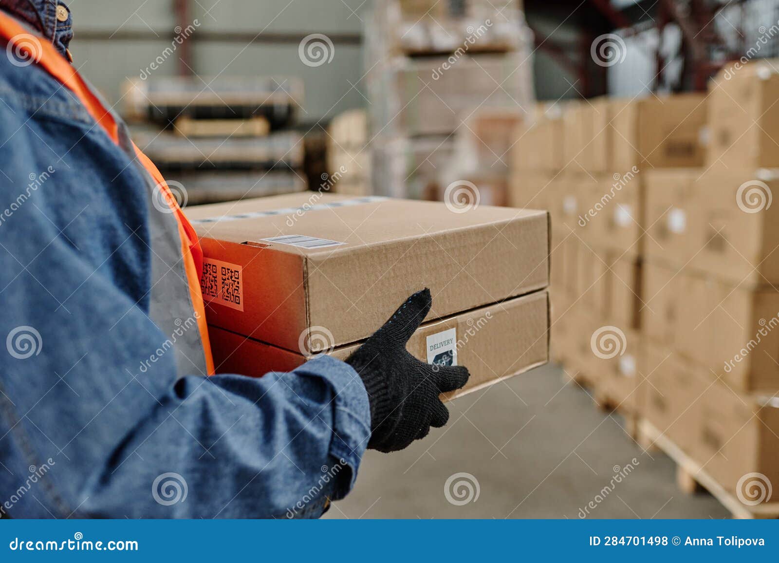Worker Carrying Boxes for Distribution in Warehouse Stock Photo - Image ...