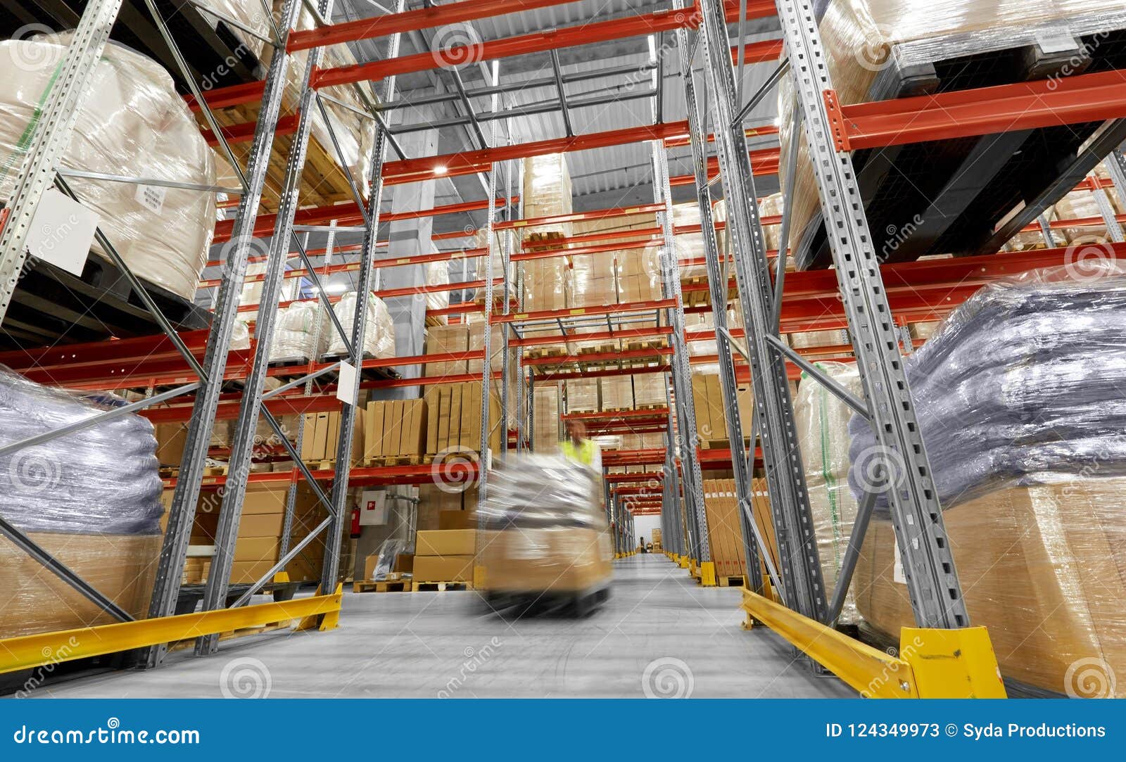 Worker Carrying Loader with Goods at Warehouse Stock Image - Image of ...