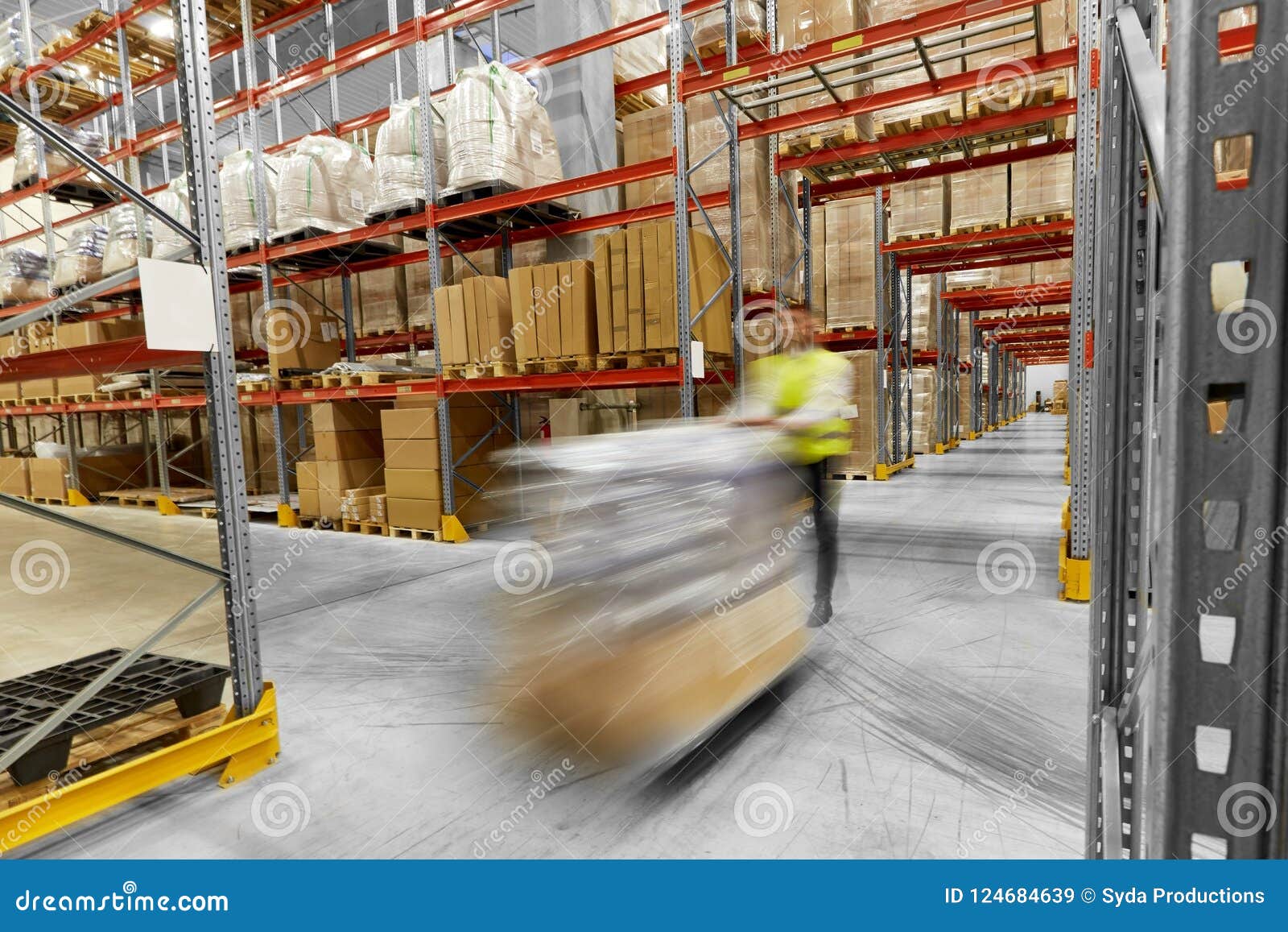 Worker Carrying Loader with Goods at Warehouse Stock Image - Image of ...
