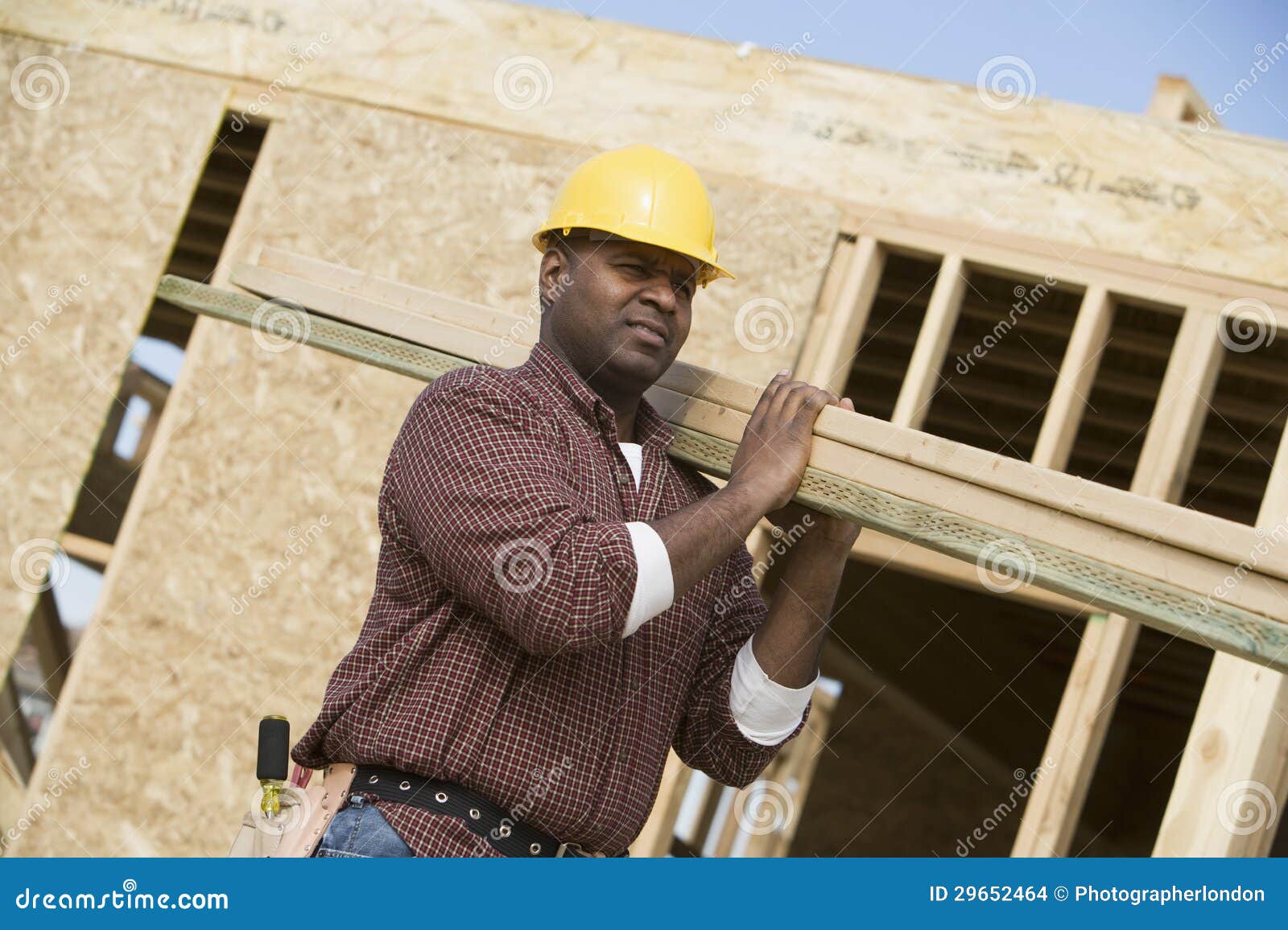 Worker Carrying Wooden Beam on Shoulder Stock Photo - Image of ...