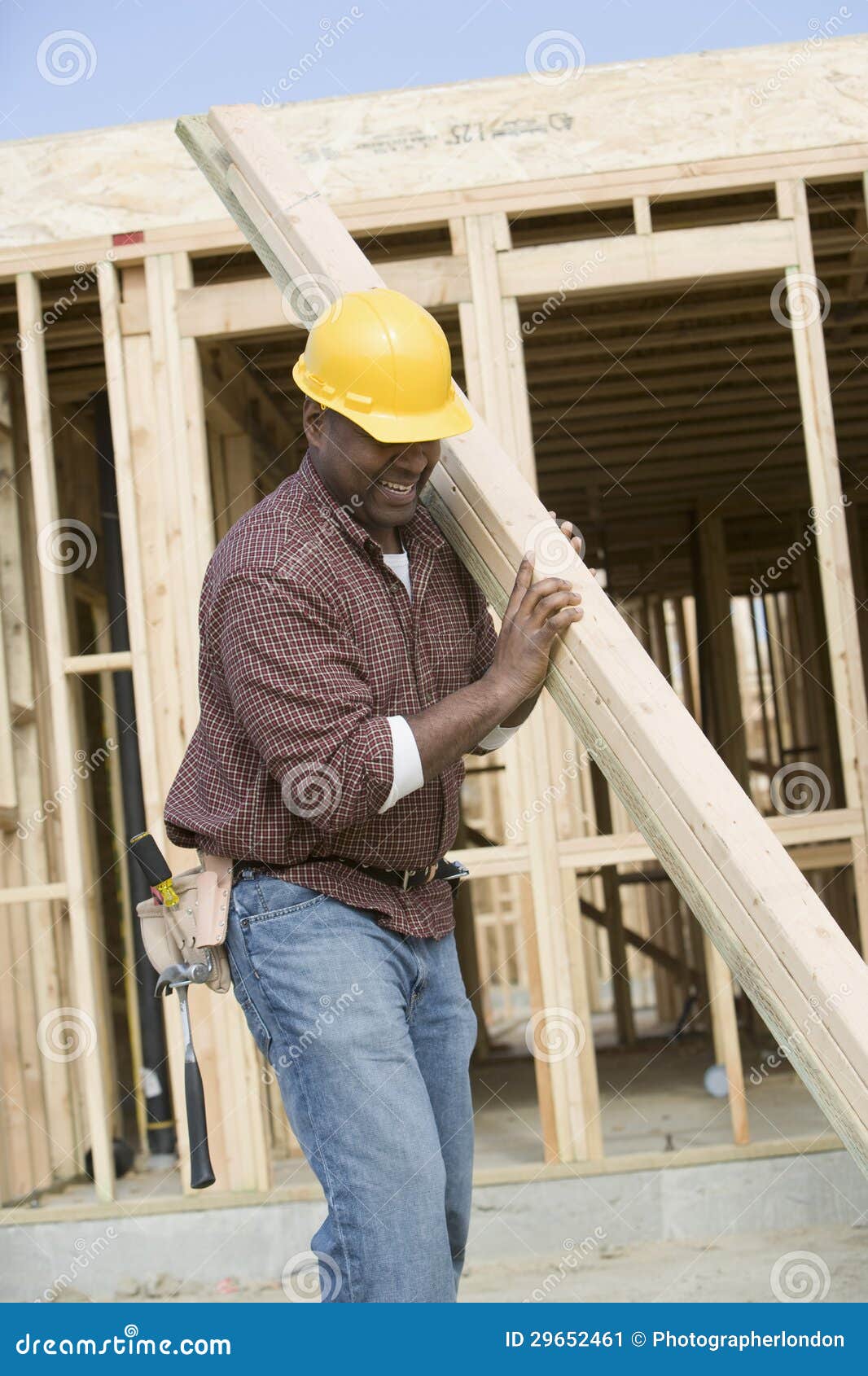 Worker Carrying Wooden Beam at Site Stock Image - Image of constructor ...