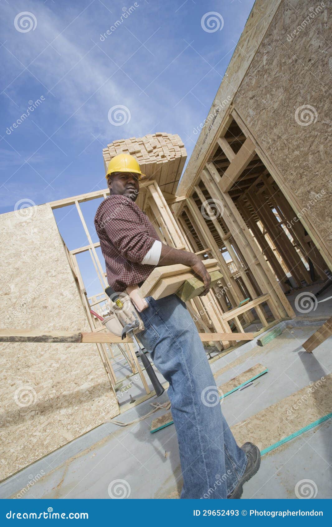 Worker Carrying Wooden Beam at Site Stock Image - Image of building ...