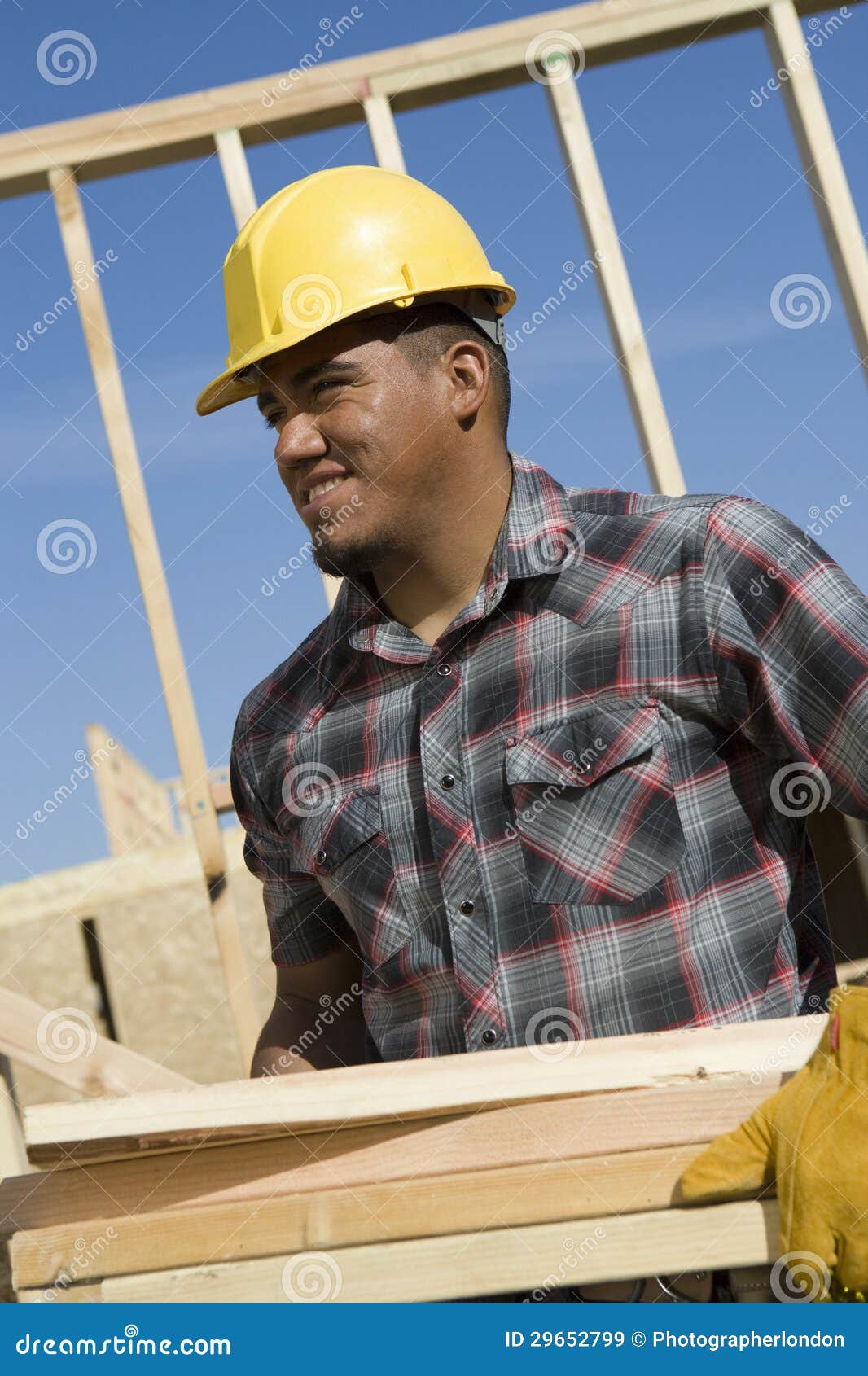 Worker Carrying Wooden Beams Stock Image - Image of site, engineer ...
