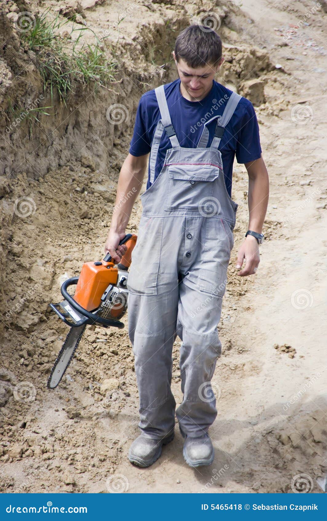 Worker with chainsaw stock photo. Image of carries, adult - 5465418