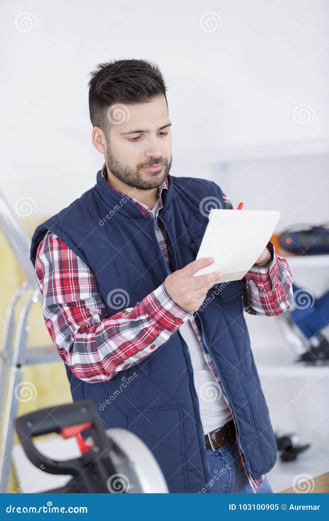 Worker Checking List in Large Warehouse Stock Image - Image of noting ...