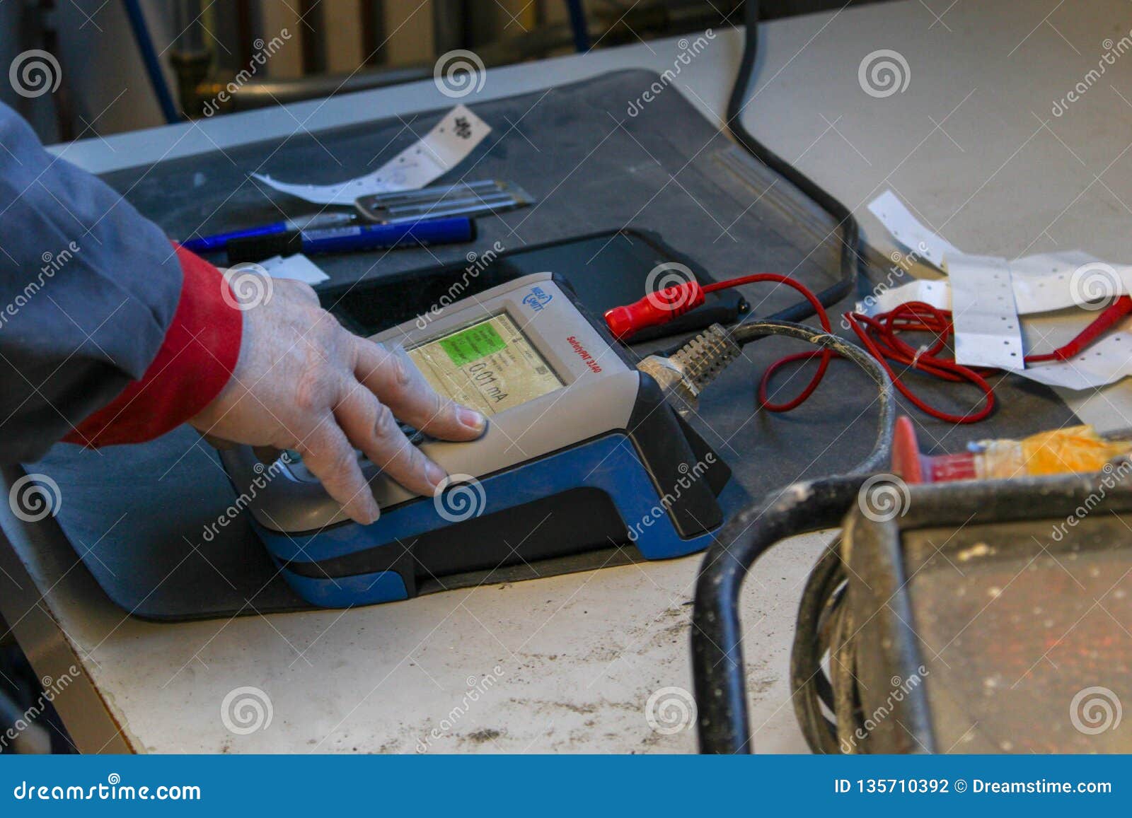A Worker Checking Materials Stock Photo - Image of inspector, material ...