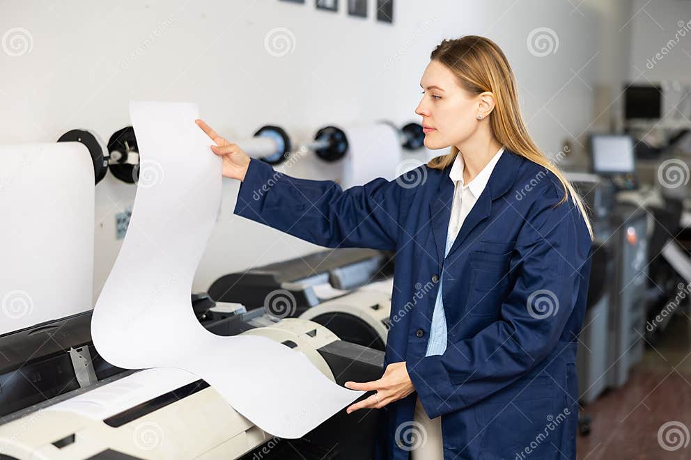 Worker Checking Paper in Printing Press Workshop Stock Photo - Image of ...